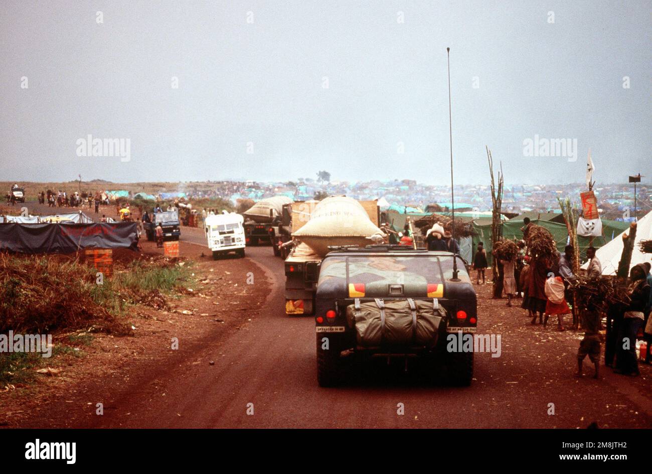 A High-Mobility Multipurpose Wheeled Vehicle (HMMWV) follow three ...
