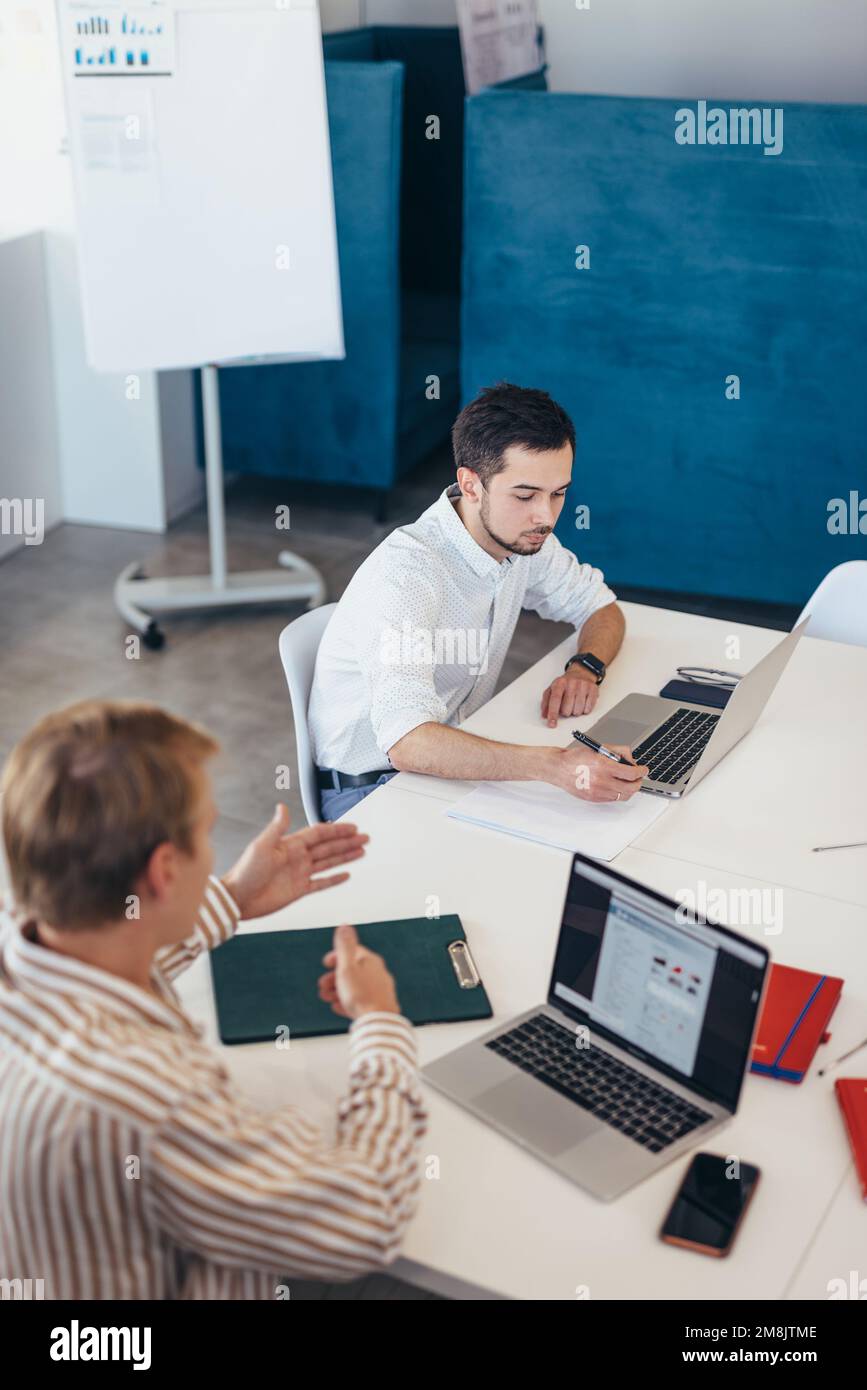 People meets at their job sitting in office Stock Photo - Alamy