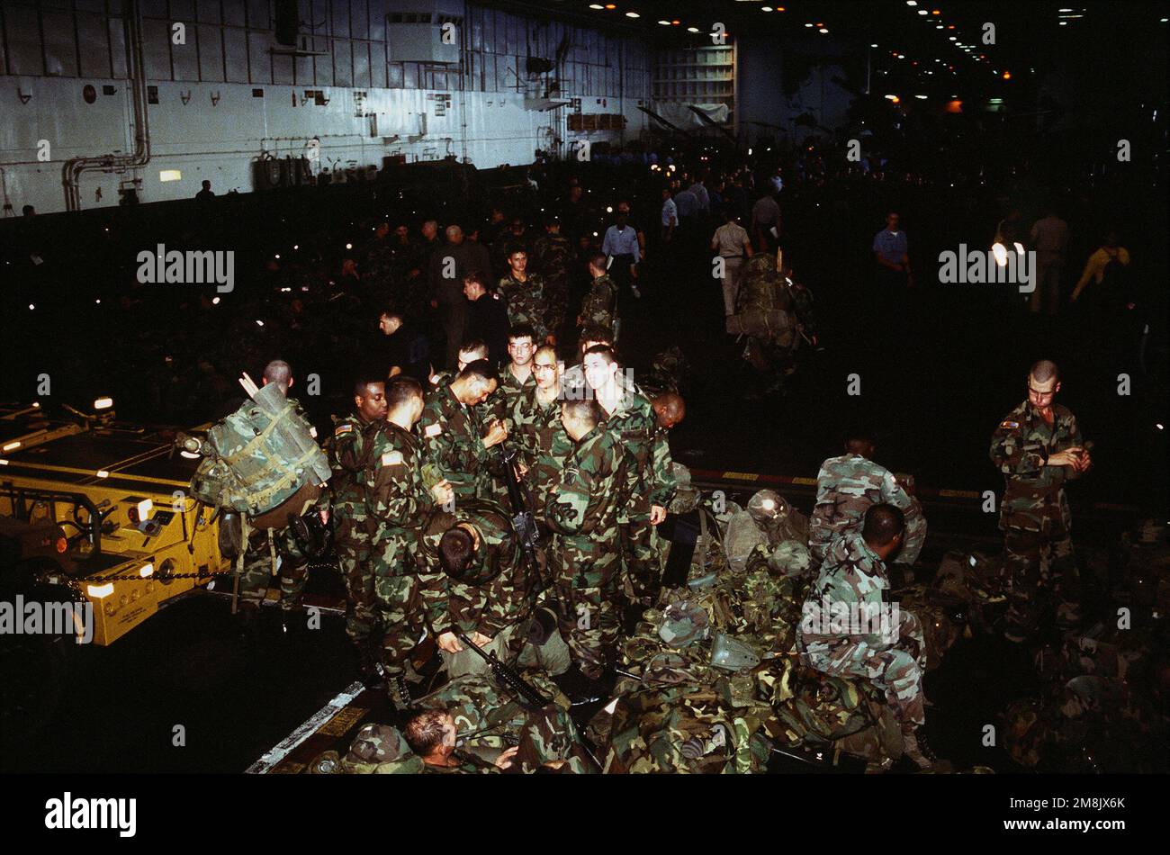 Soldiers from the 10th Mountain Division, FT. Drum, NY, wait inside the ...