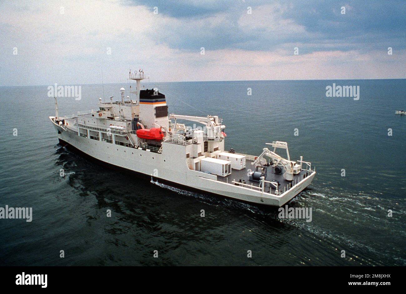 A port quarter view of the Military Sealift Command survey ship USNS ...