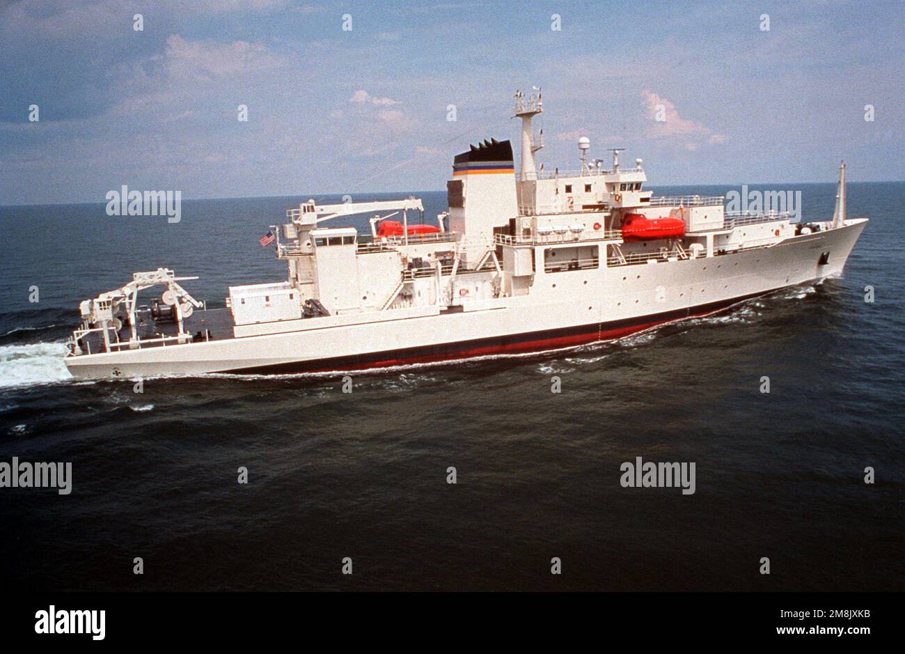 A starboard quarter view of the Military Sealift Command survey ship ...