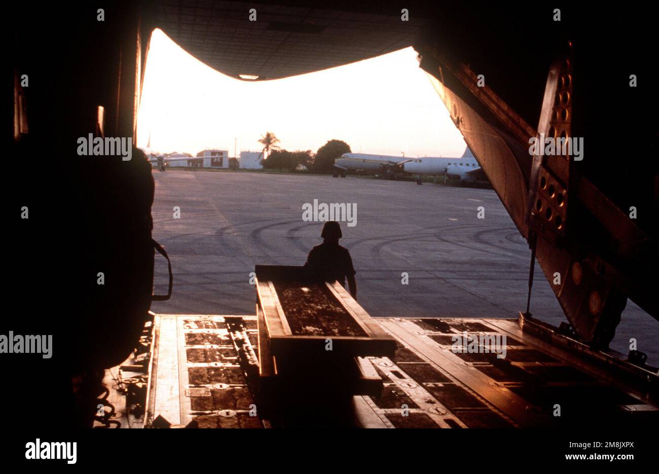 US military personnel put the auxiliary loading ramps back with the ...