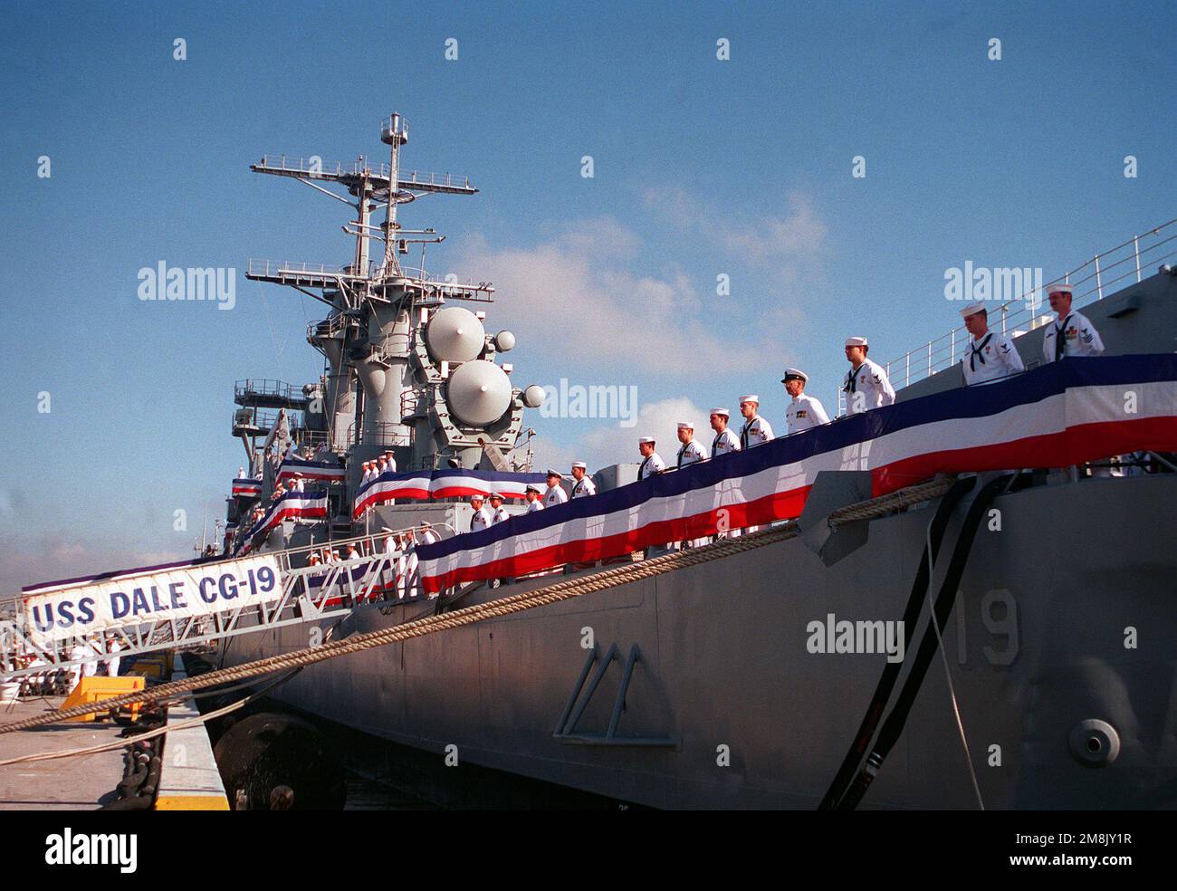 A port quarter view of the guided missile cruiser USS DALE (CG-19) with ...