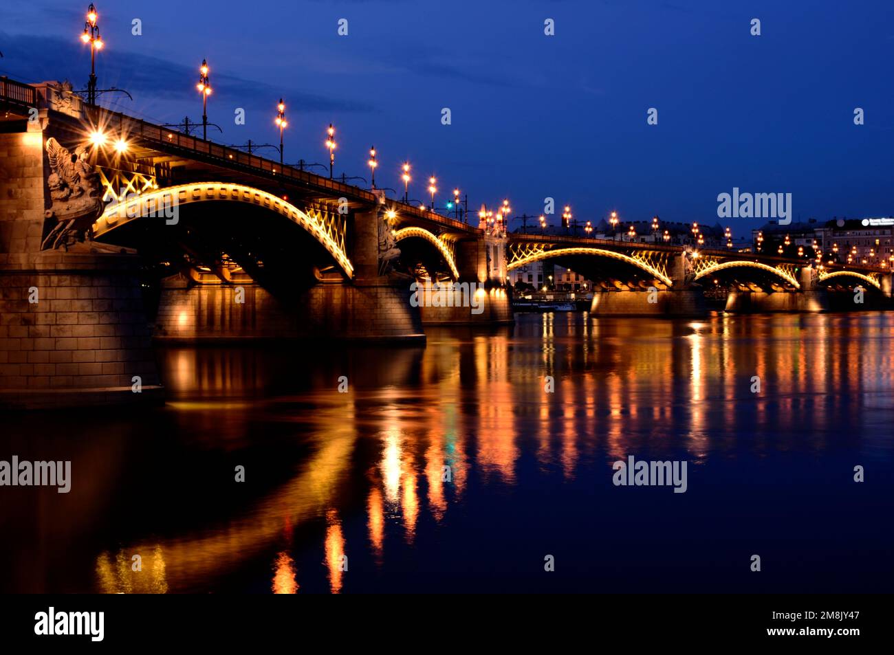 the Margaret bridge in Budapest at dusk. perspective side view ...