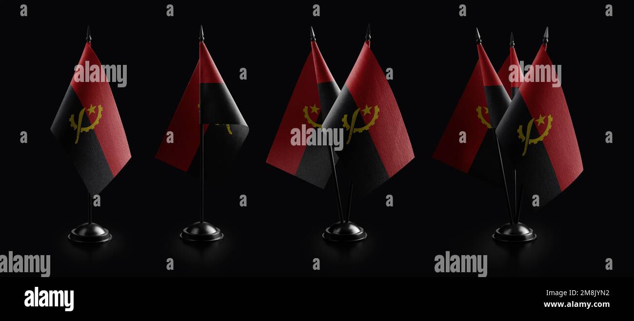 Small national flags of the Angola on a black background Stock Photo ...
