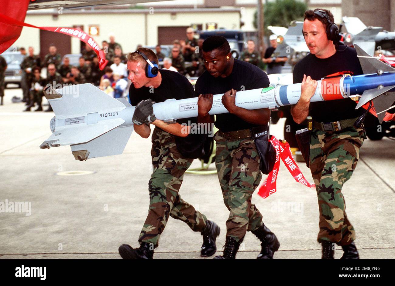(L-R) TECH. SGT. Bob Herr, STAFF SGT. Mike Hawkins, and SENIOR AIRMAN ...