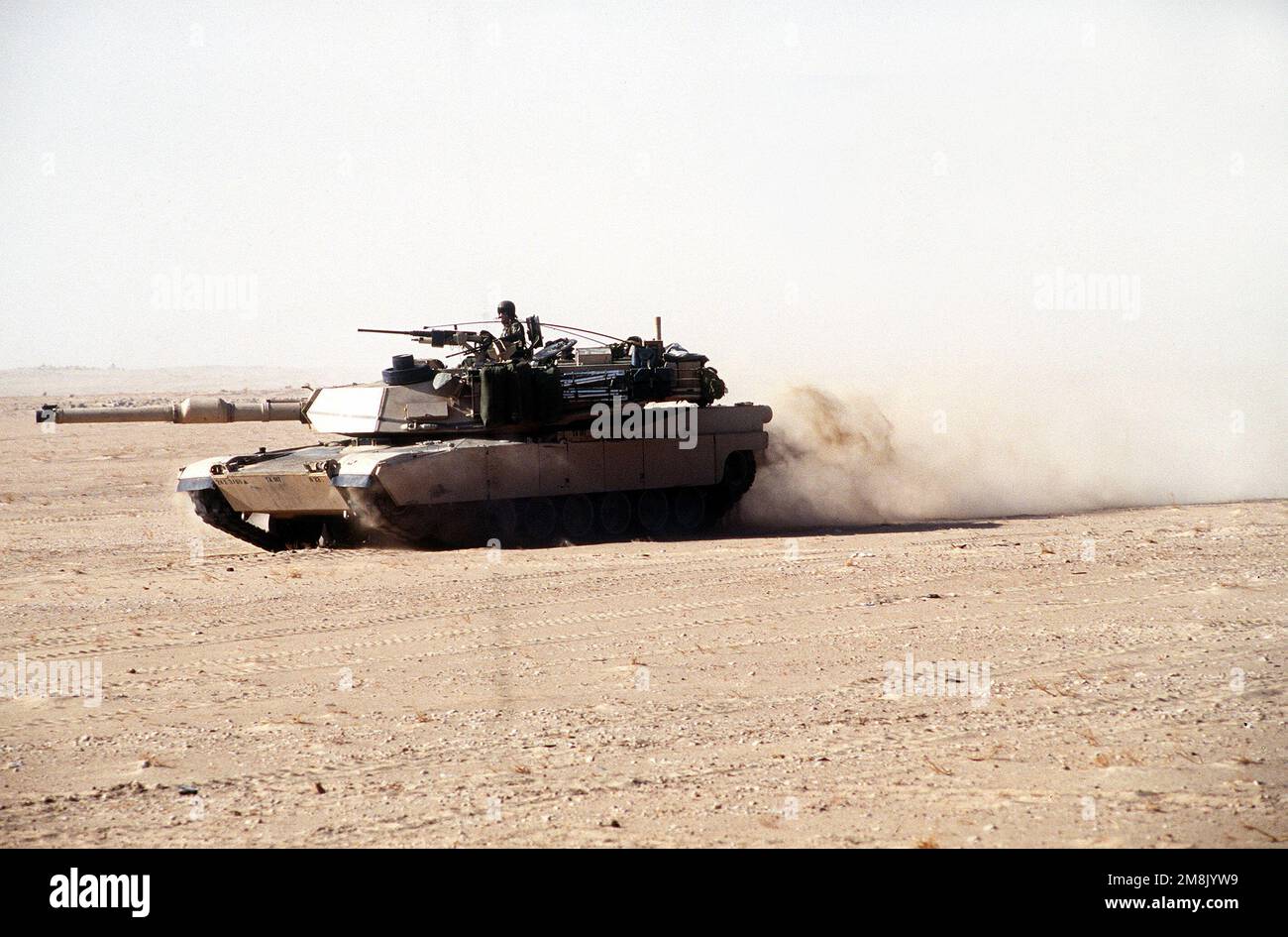A M1A1 Abrams tank during mounted patrol out of the Tactical Assembly ...