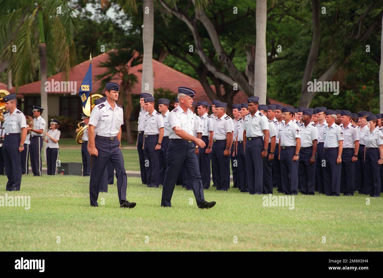 GEN. Robert L. Rutherford inspects the 15 Air Base Wing personnel ...