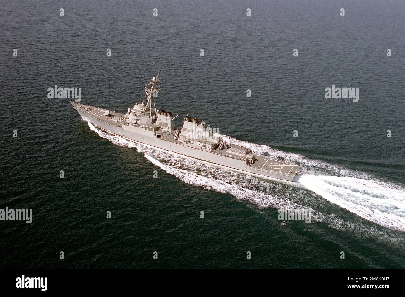 Oblique aerial port side view of the guided missile destroyer USS BARRY ...