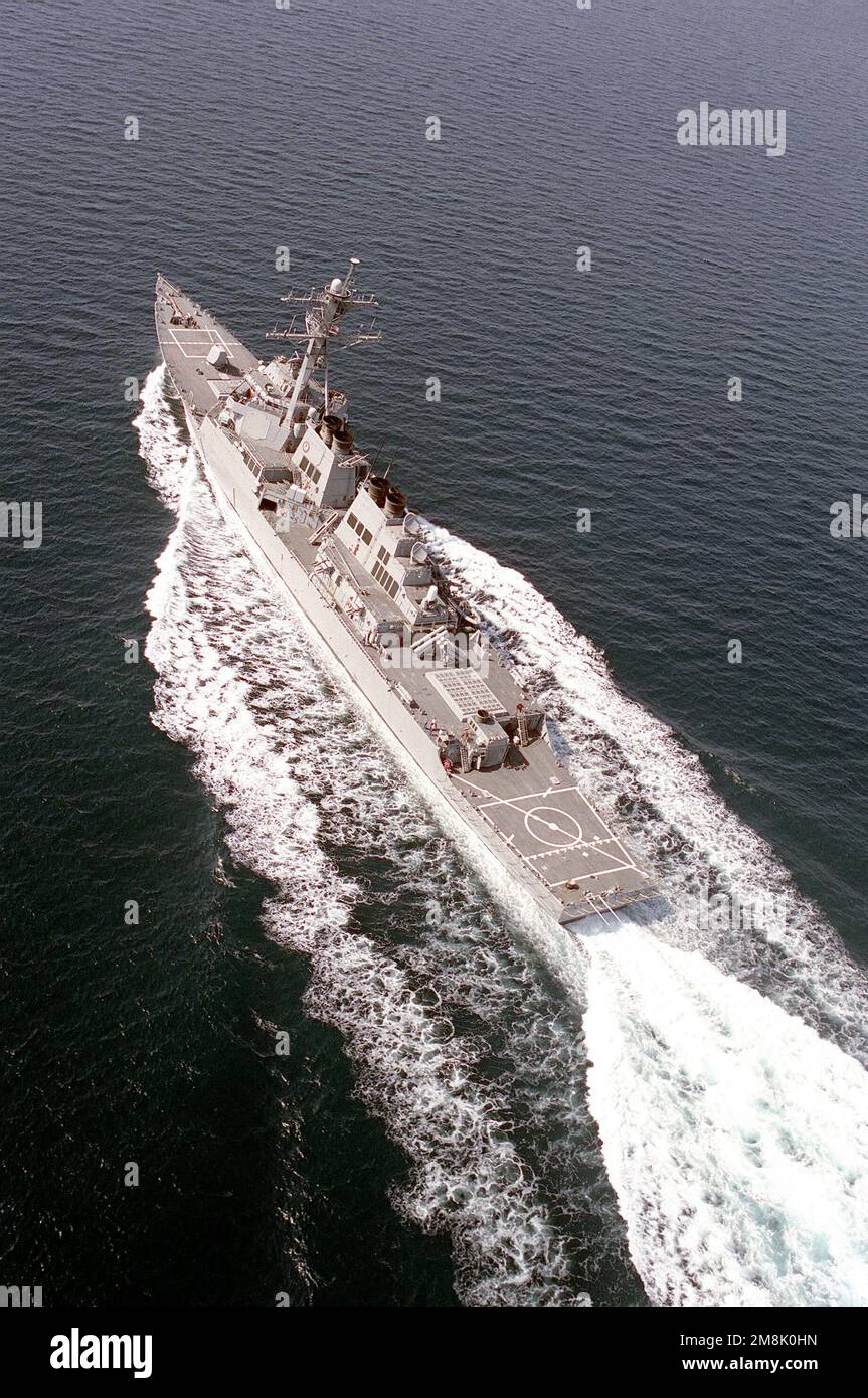 Oblique aerial port quarter view of the guided missile destroyer USS ...