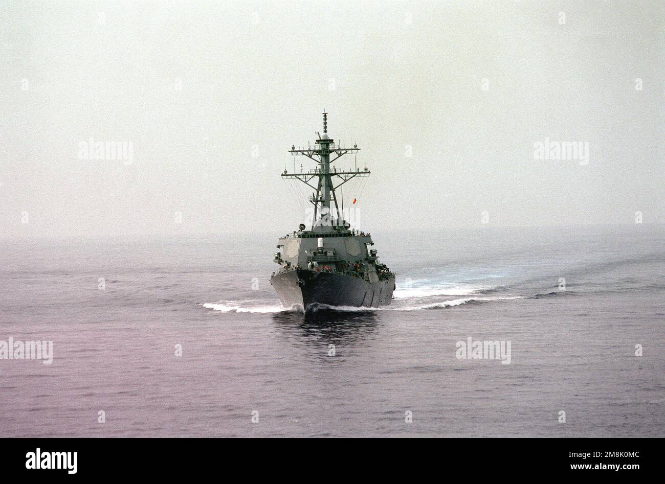 A bow-on (off centerline) view of the guided missile destroyer USS ...