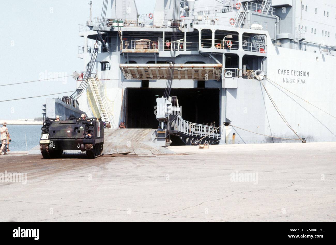 A M113A2 armored personnel carrier rolls off the Military Sealift ...