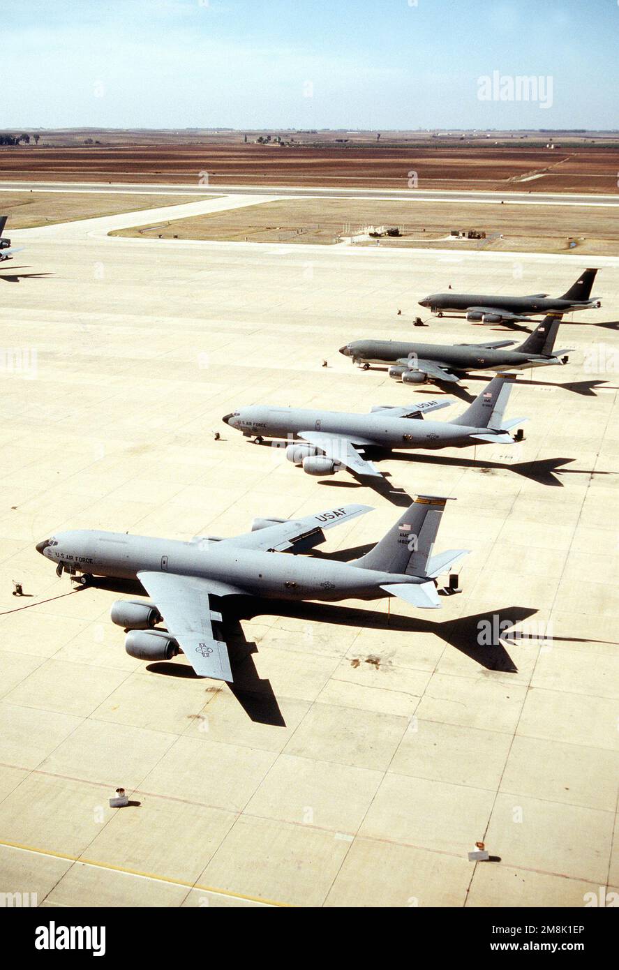 A high right side view of KC-135s on the flightline in support of the ...