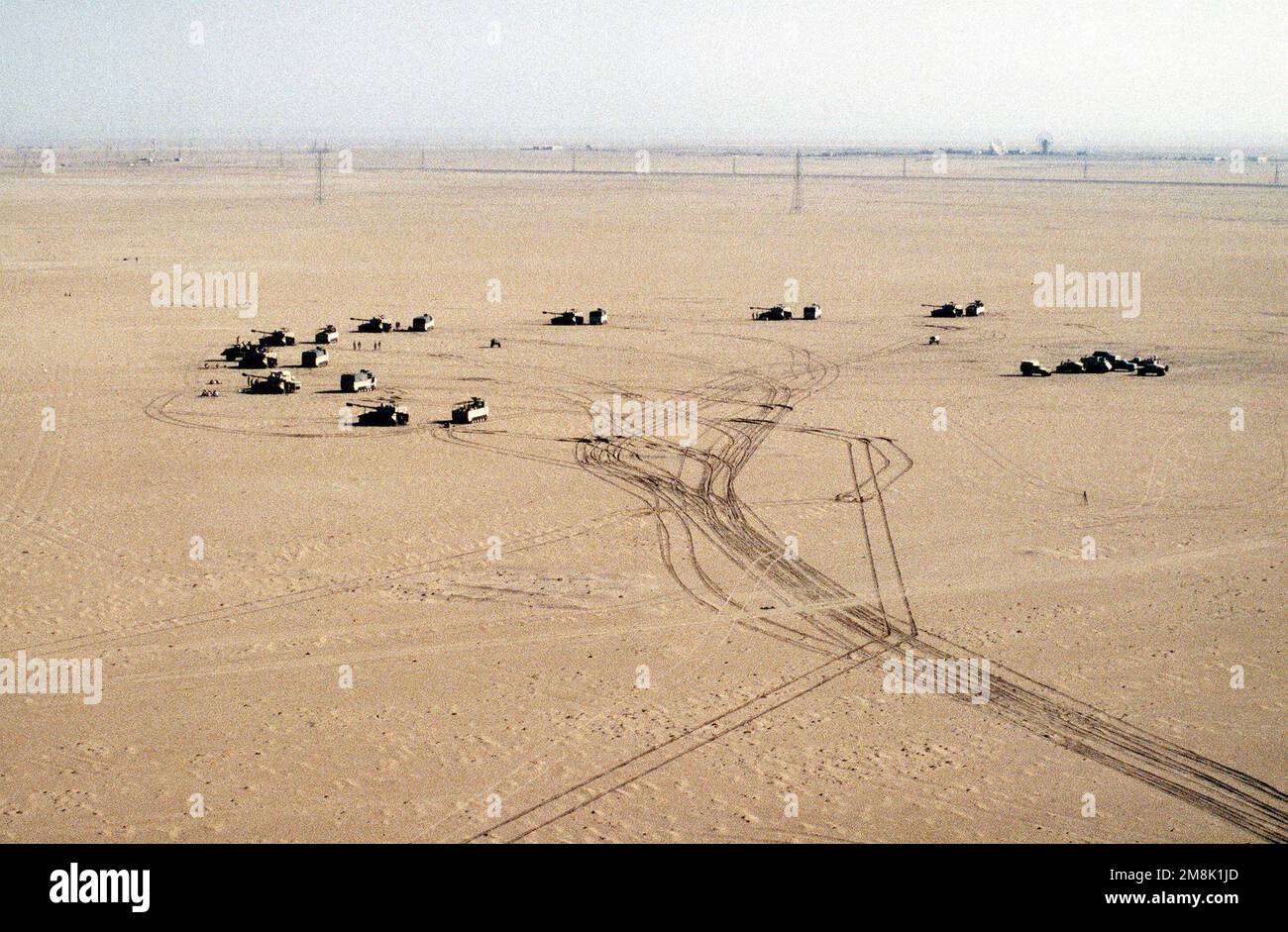 Long aerial view of a Kuwait Army mechanized unit comprised of self ...
