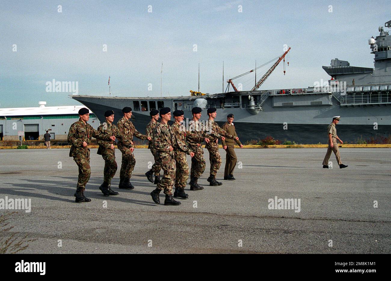 A unit of shipboard Italian Marines goes through marching drills on the ...