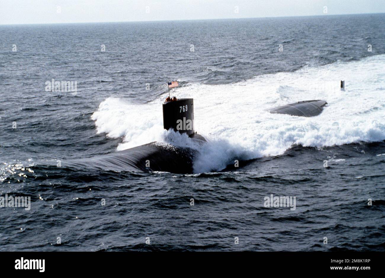 A port bow view of the nuclear-powered attack submarine USS Toledo (SSN ...