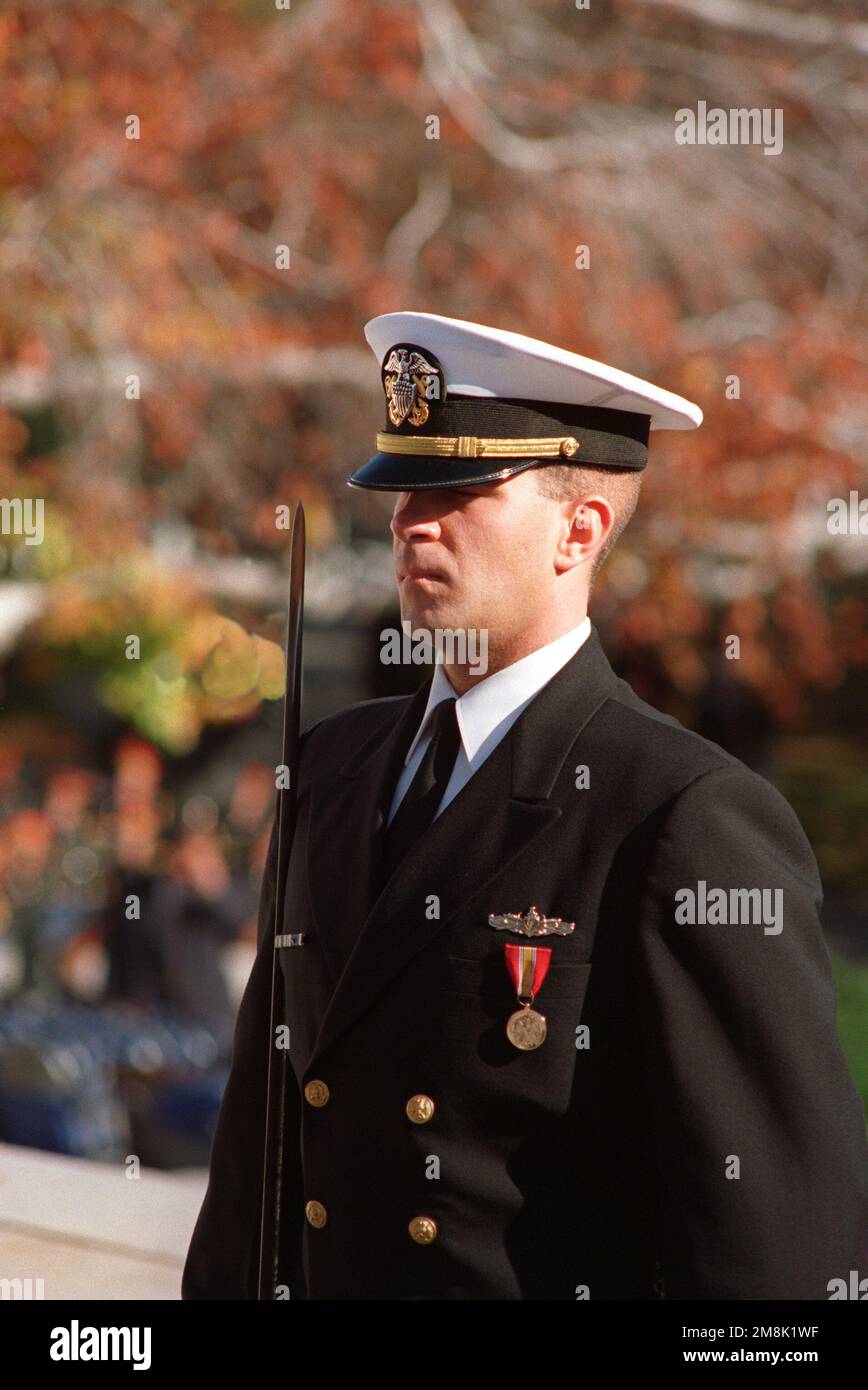 The Navy Ceremonial Honor Guard Officer-In-Charge comes to attention ...