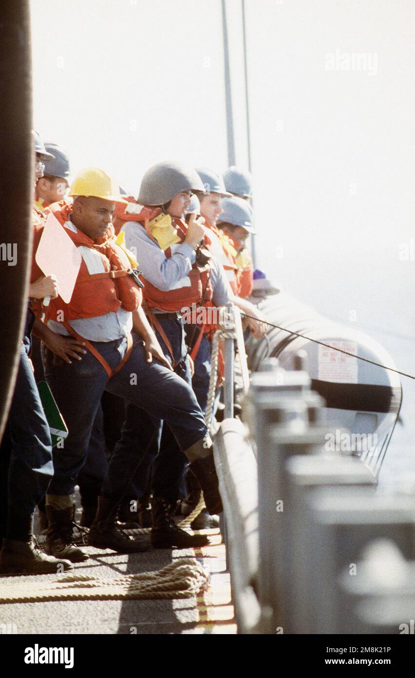 Sailors aboard USS SEATTLE (AOE-3) prepare for underway replenishment ...