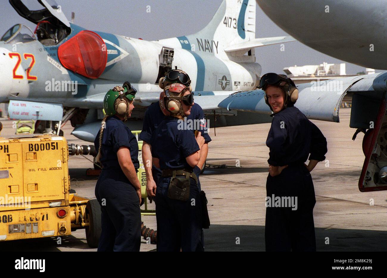 Plane captains for Fighter Squadron 126 (VF-126), prepare for preflight ...