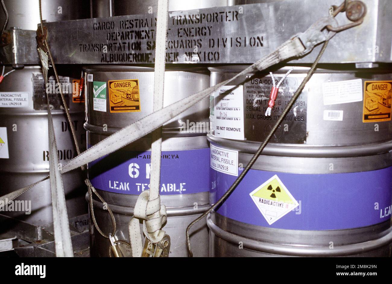 A close-up view of the canisters of radioactive materials strapped down ...