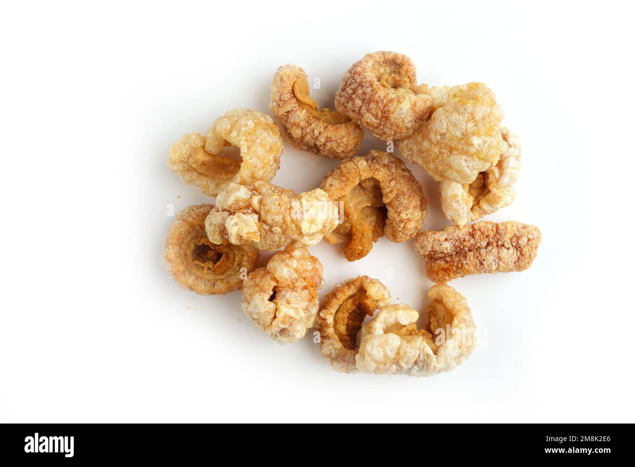 An image of a yellow dry pig skin on the white background Stock Photo ...