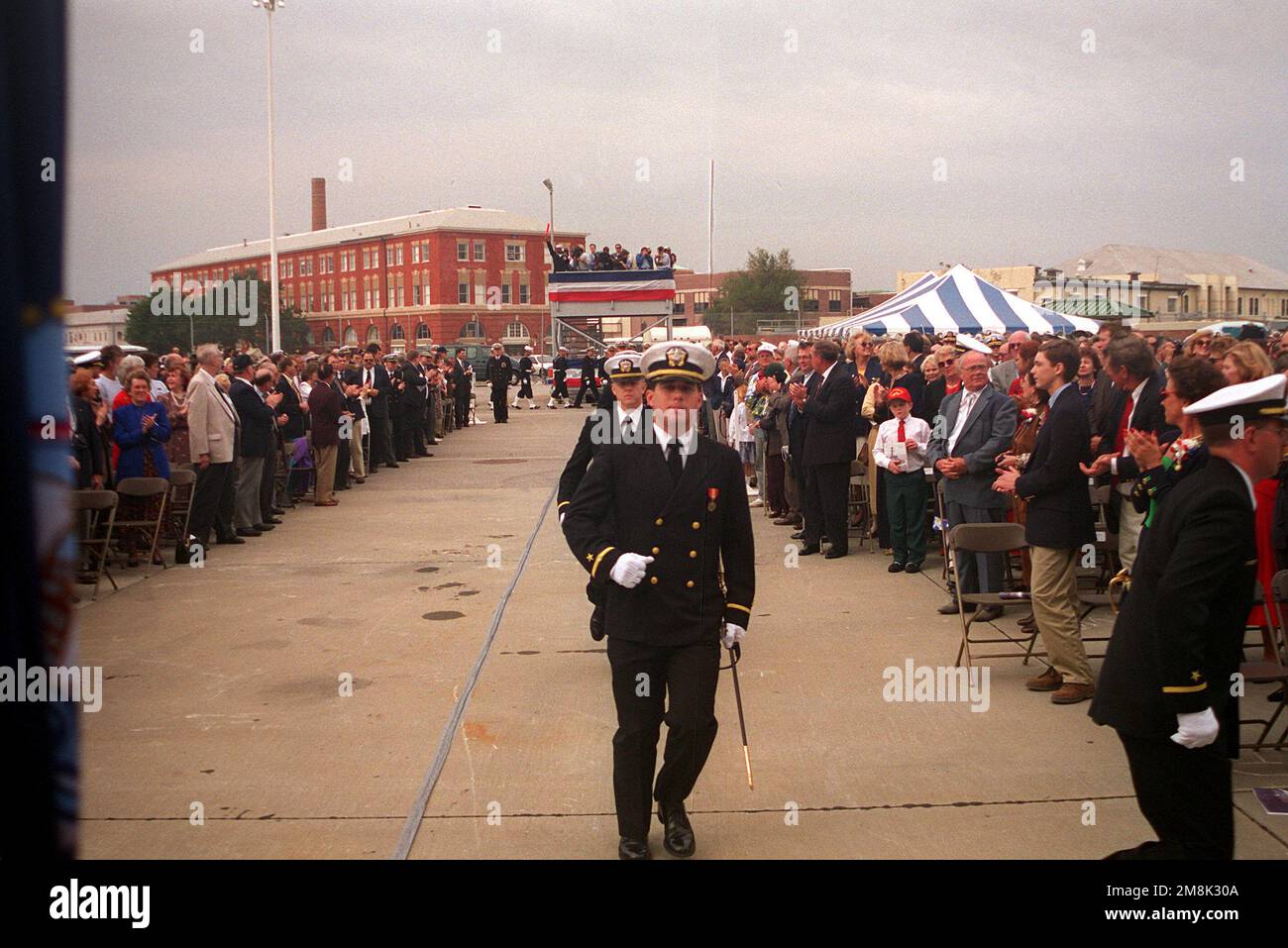 Officers of the guided missile destroyer USS Mitscher (DDG-57) dash ...