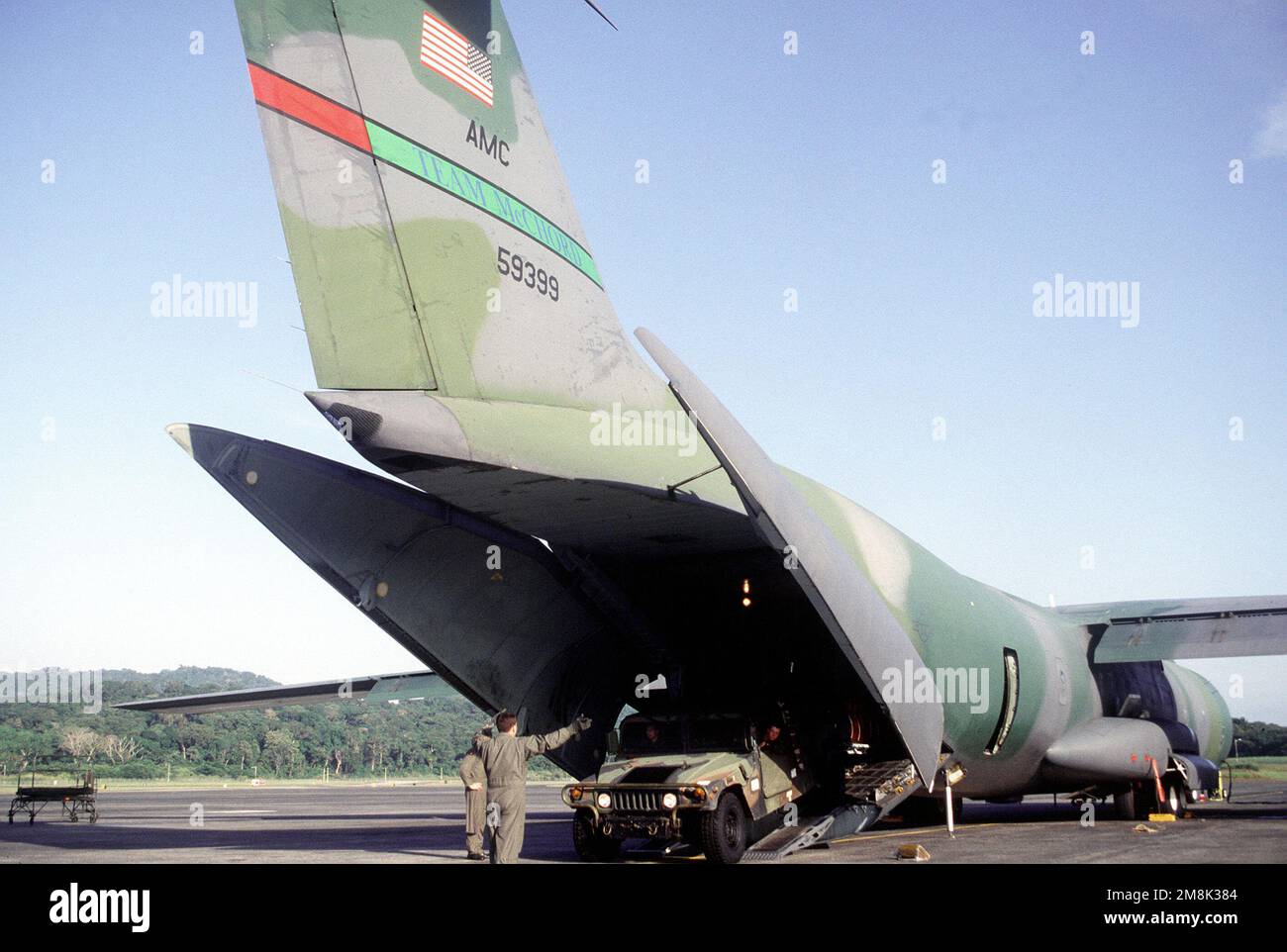 A U.S. Army High-Mobility Multipurpose Wheeled Vehicle (HMMWV) is ...