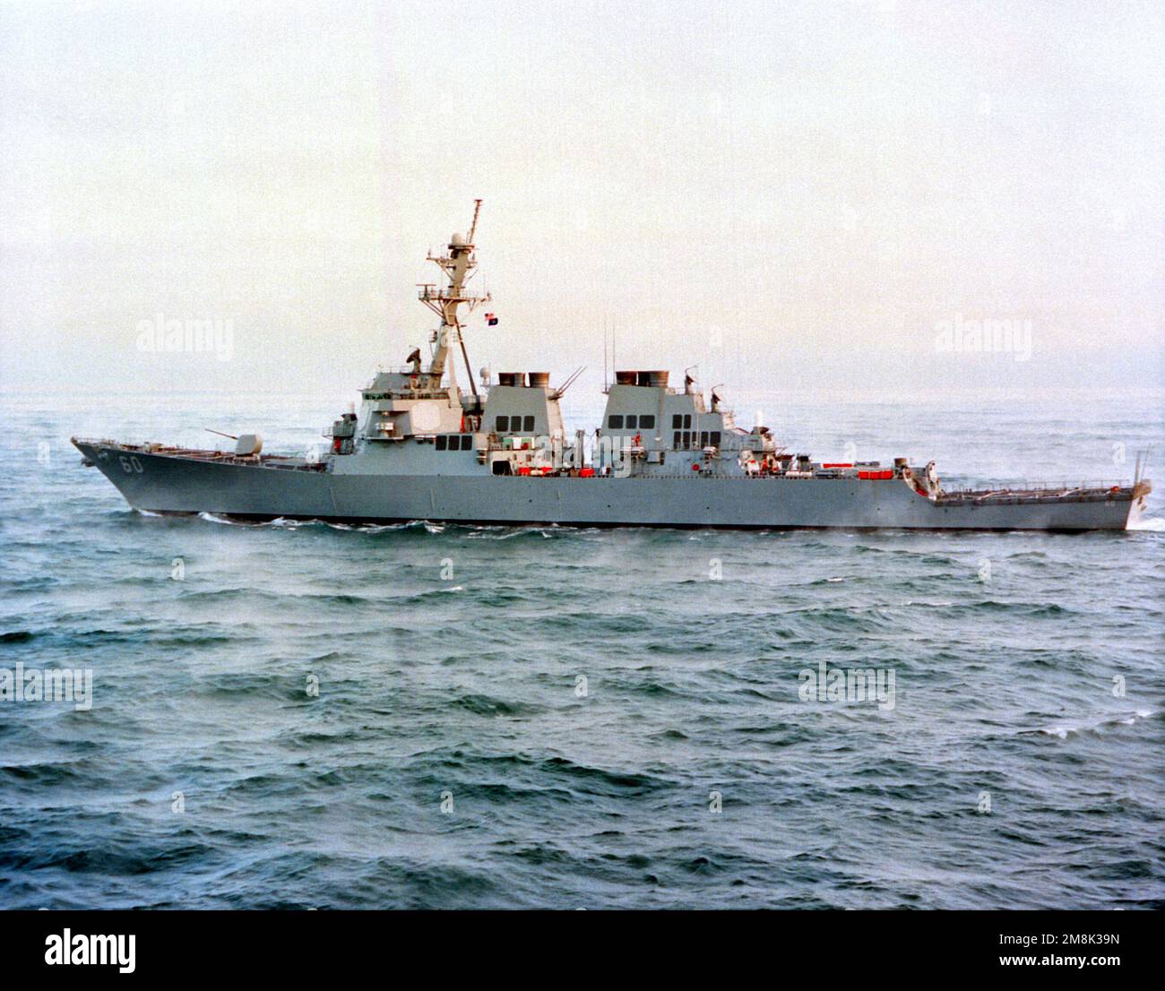 A port side view of the guided missile destroyer USS PAUL HAMILTON (DDG ...