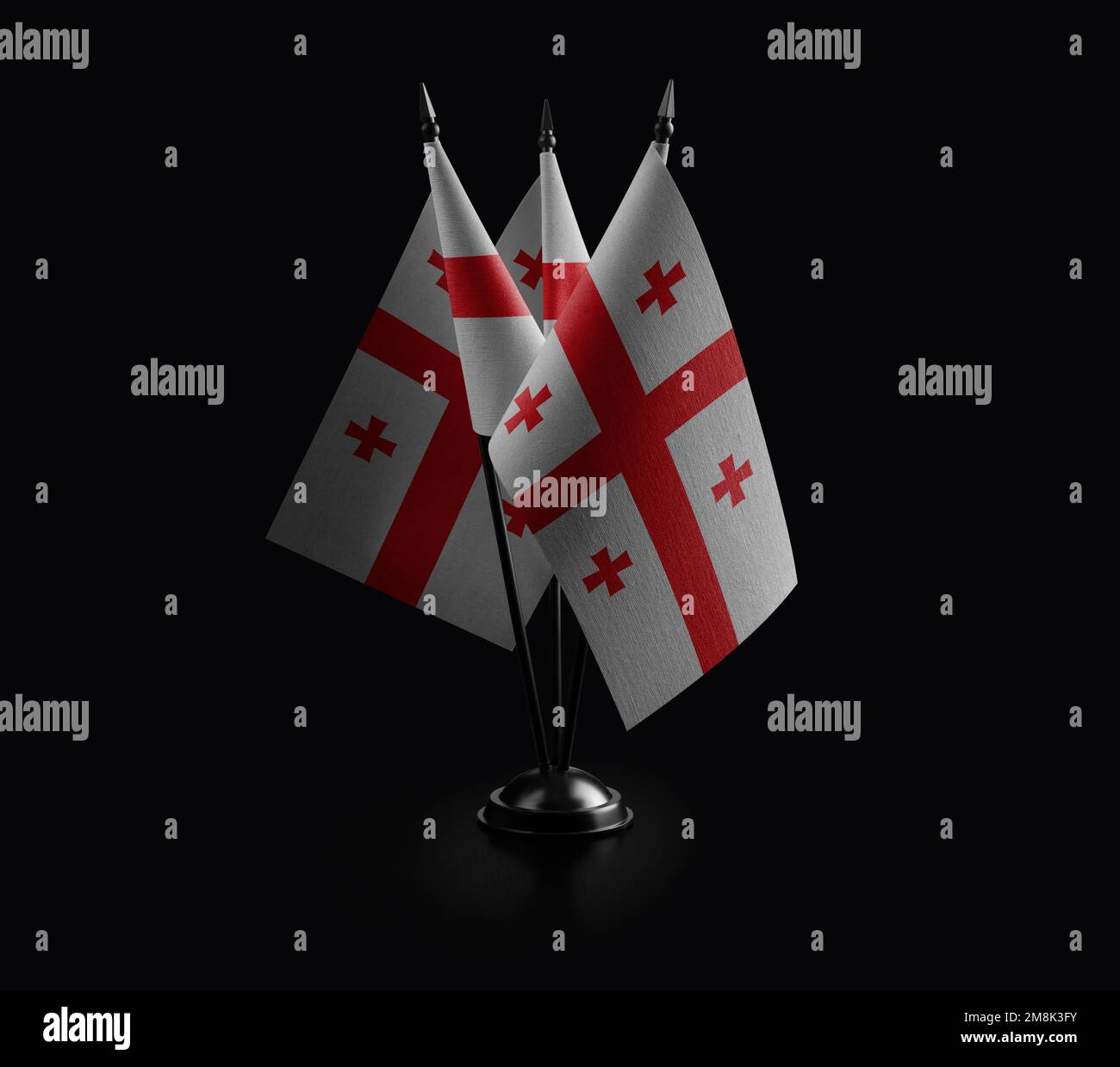 Small national flags of the Georgia on a black background Stock Photo ...