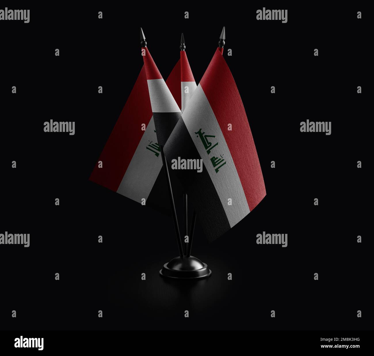 Small national flags of the Iraq on a black background Stock Photo - Alamy