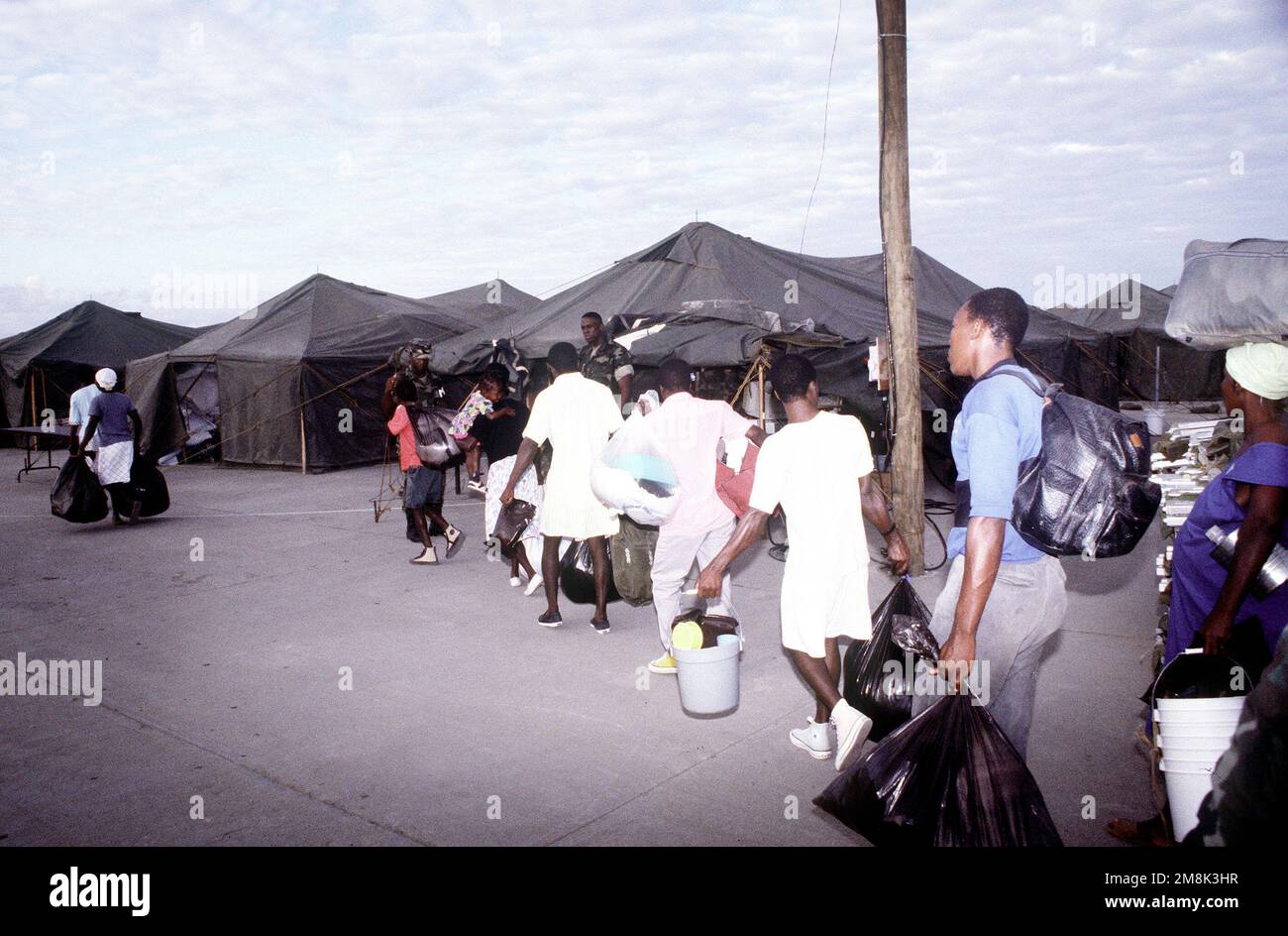 Haitian migrants who have decided not to return to Haiti voluntarily ...