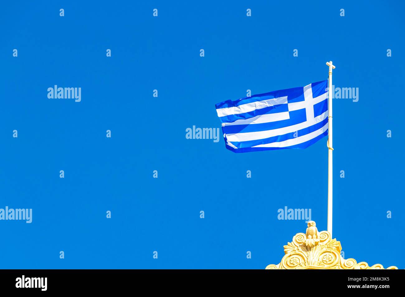Greek flag on sunny day with blue sky in Athens Greece Stock Photo - Alamy