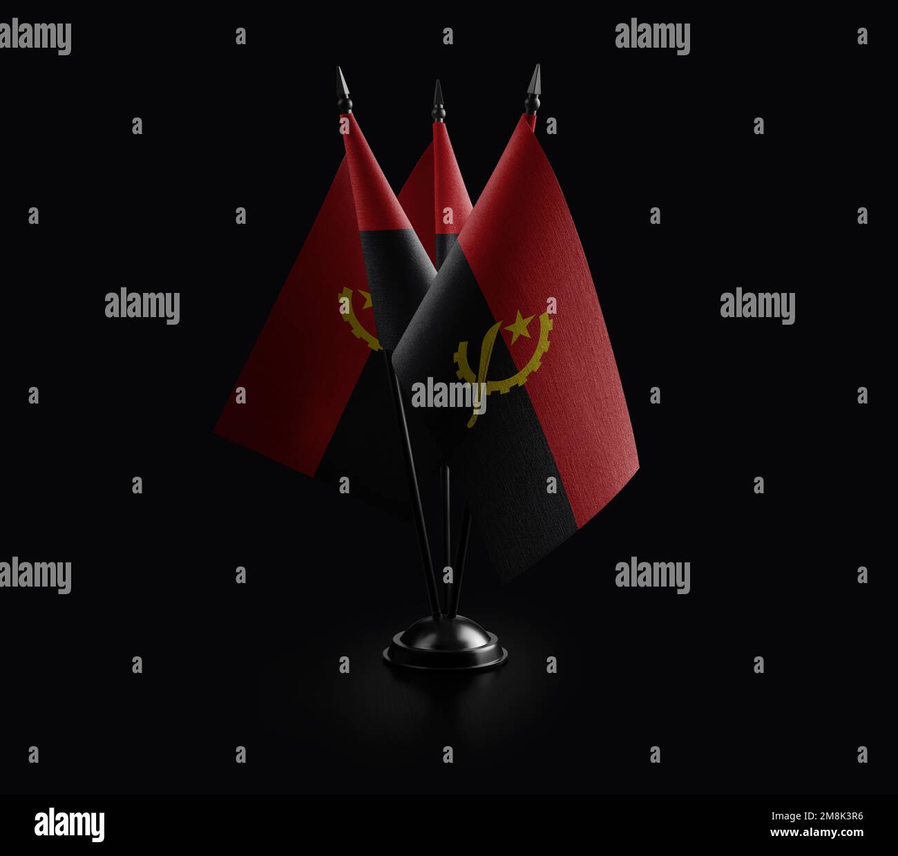 Small national flags of the Angola on a black background Stock Photo ...