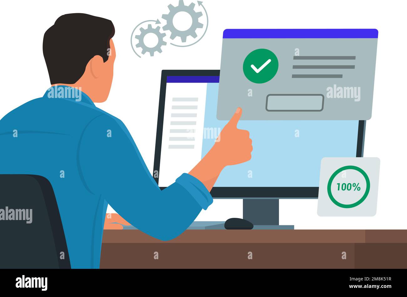 Man sitting at desk using a computer and giving a thumbs up, he ...