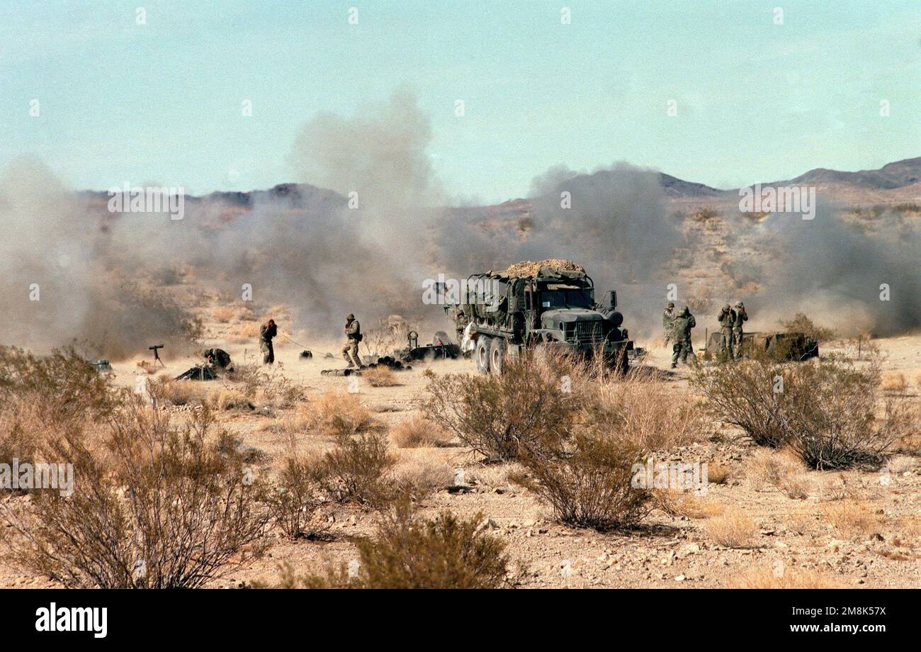 Long shot, front view, M813 5 ton truck. M198 155 mm Howitzer, cloud of ...