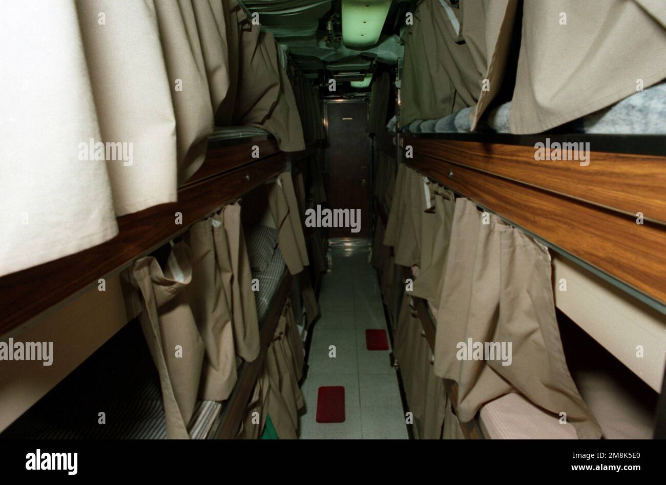 A view looking down through the crews berthing spaces on board the ...