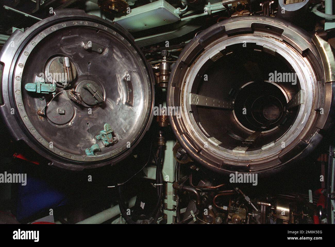 Looking past the open breach door into the number two torpedo tube on ...