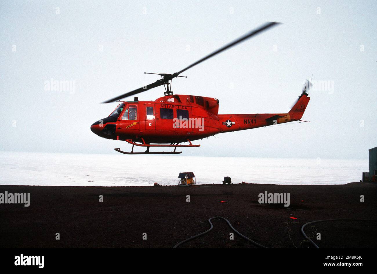 Flight LT. Stu Brownie observes from the co-pilot seat as LT. Greg ...