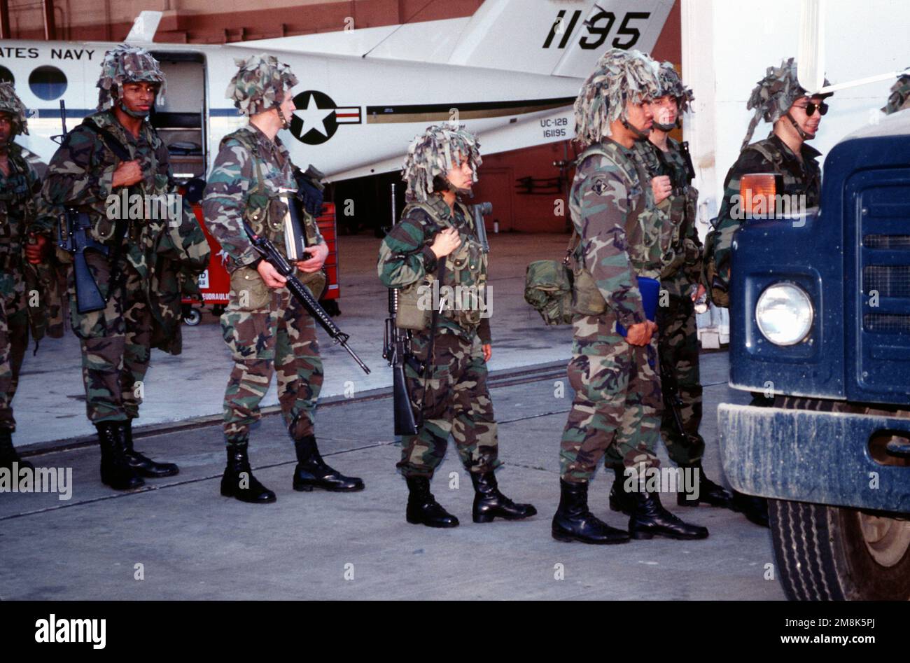Members of the 3rd Battalion 9th Infantry Regiment board a bus for in ...