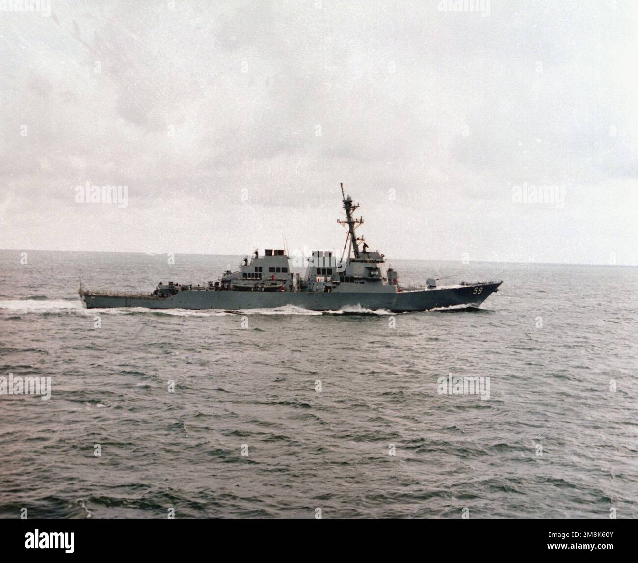 An aerial starboard beam (off centerline) view of the guided missile ...