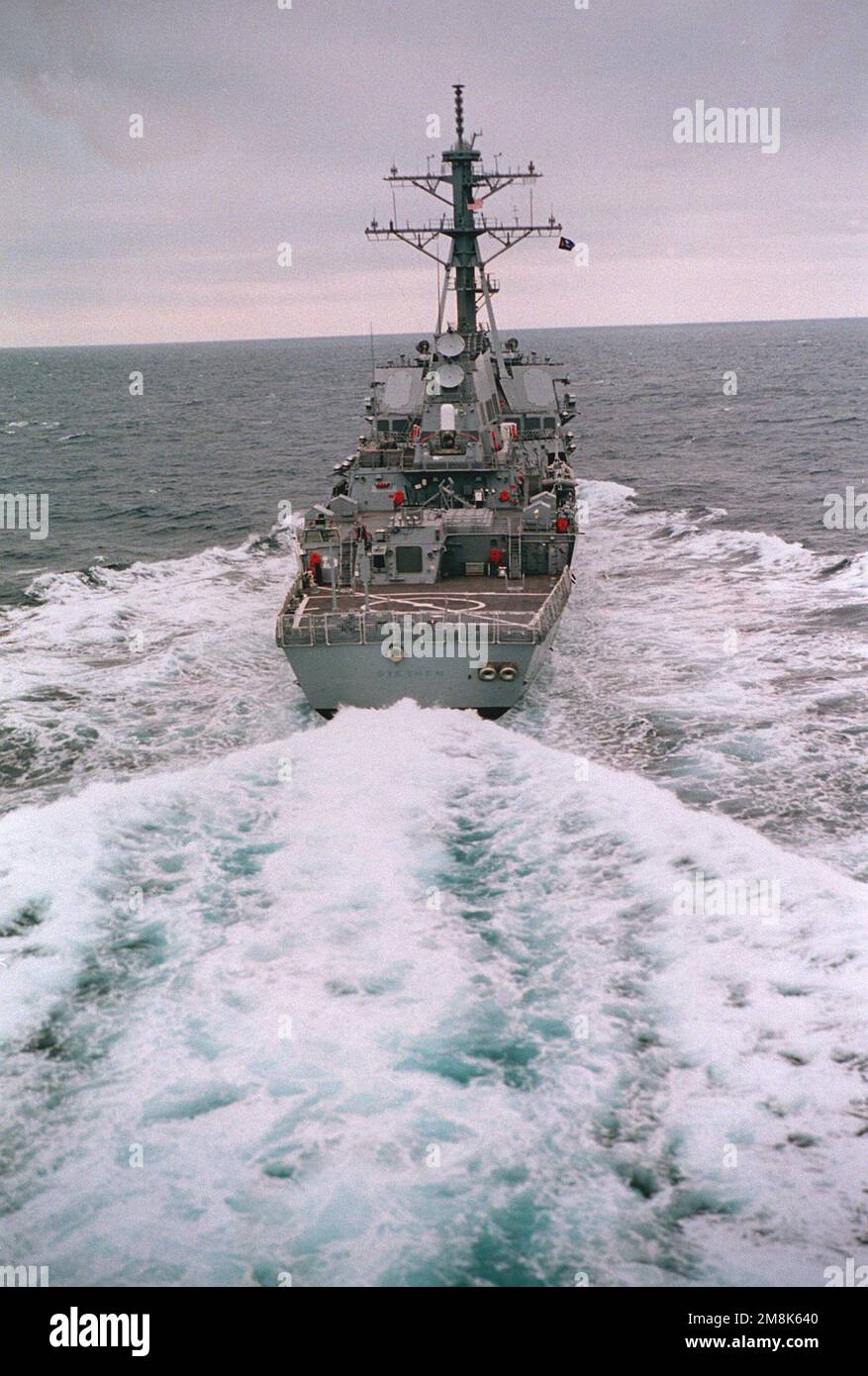 An aerial stern-on view of the guided missile destroyer USS Stethem ...