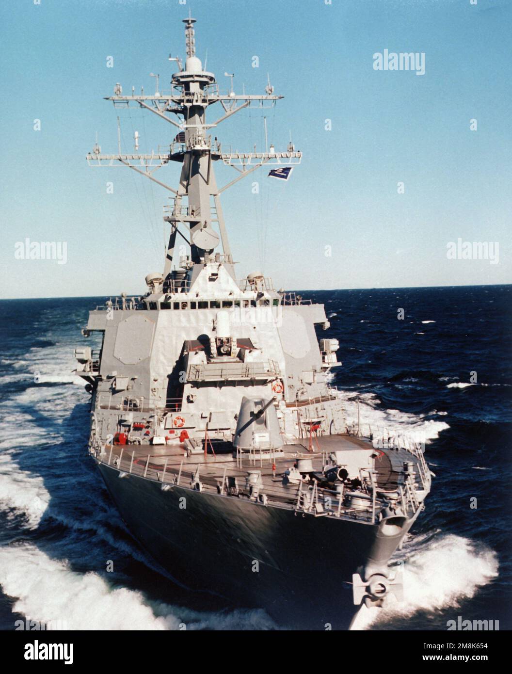 An aerial bow-on view (off centerline) of the guided missile destroyer ...