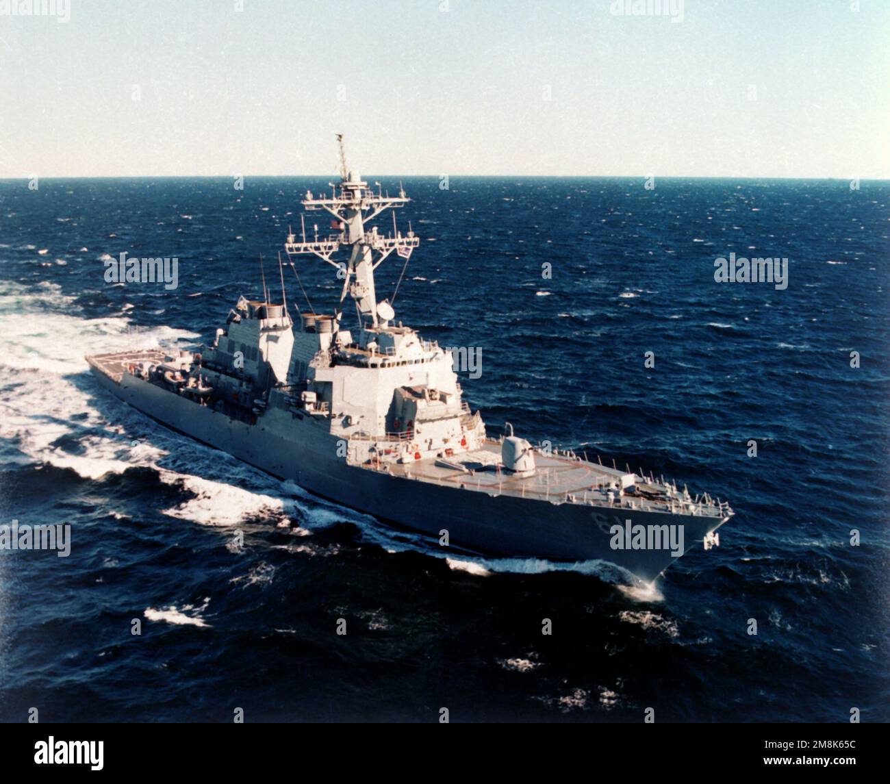 An aerial starboard bow view of the guided missile destroyer USS Ramage ...