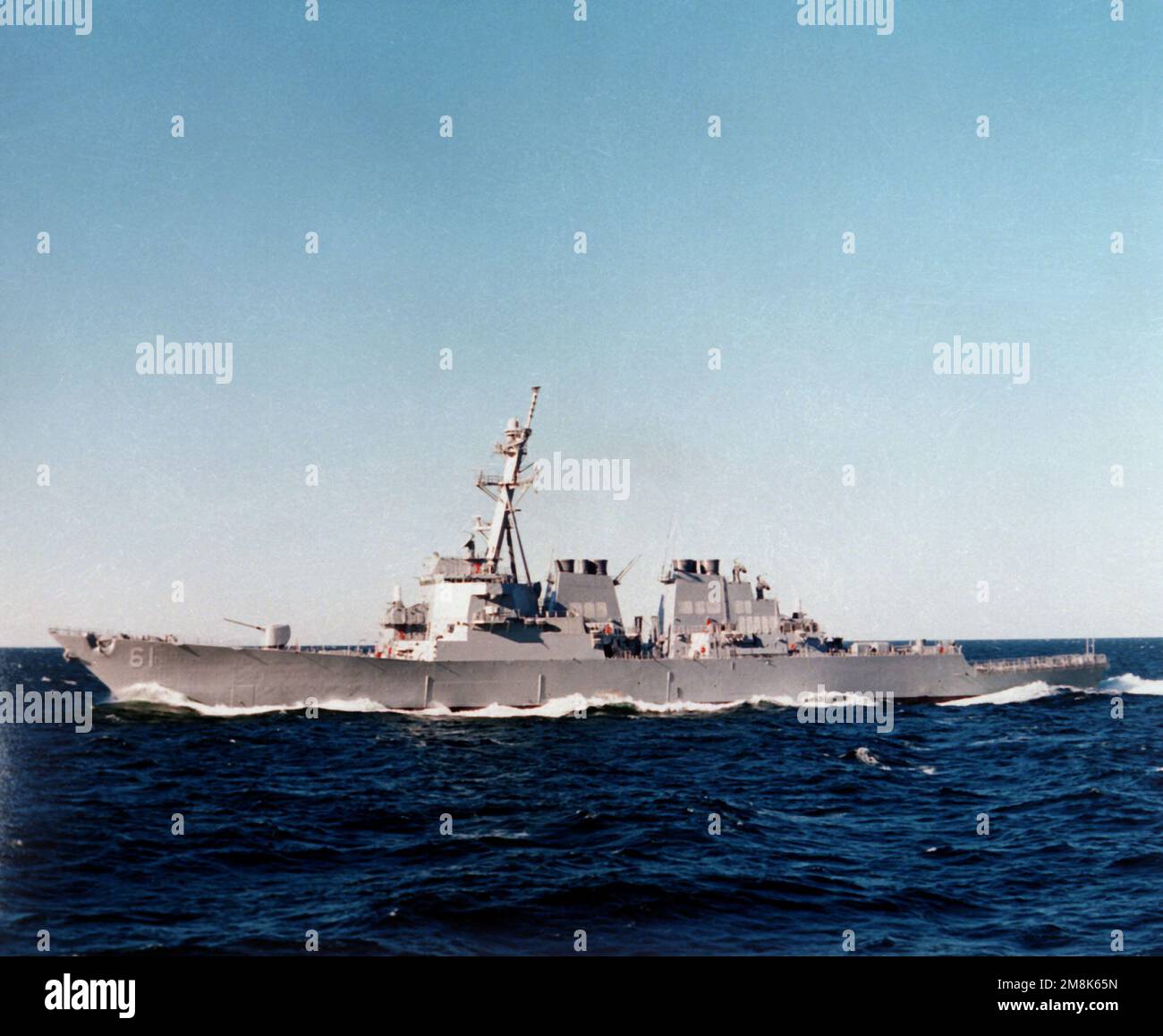 An aerial port side view of the guided missile destroyer USS Ramage ...