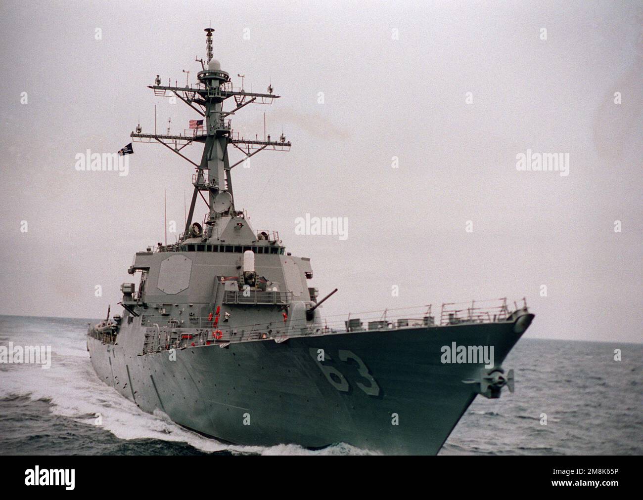 An aerial starboard bow view of the guided missile destroyer USS ...