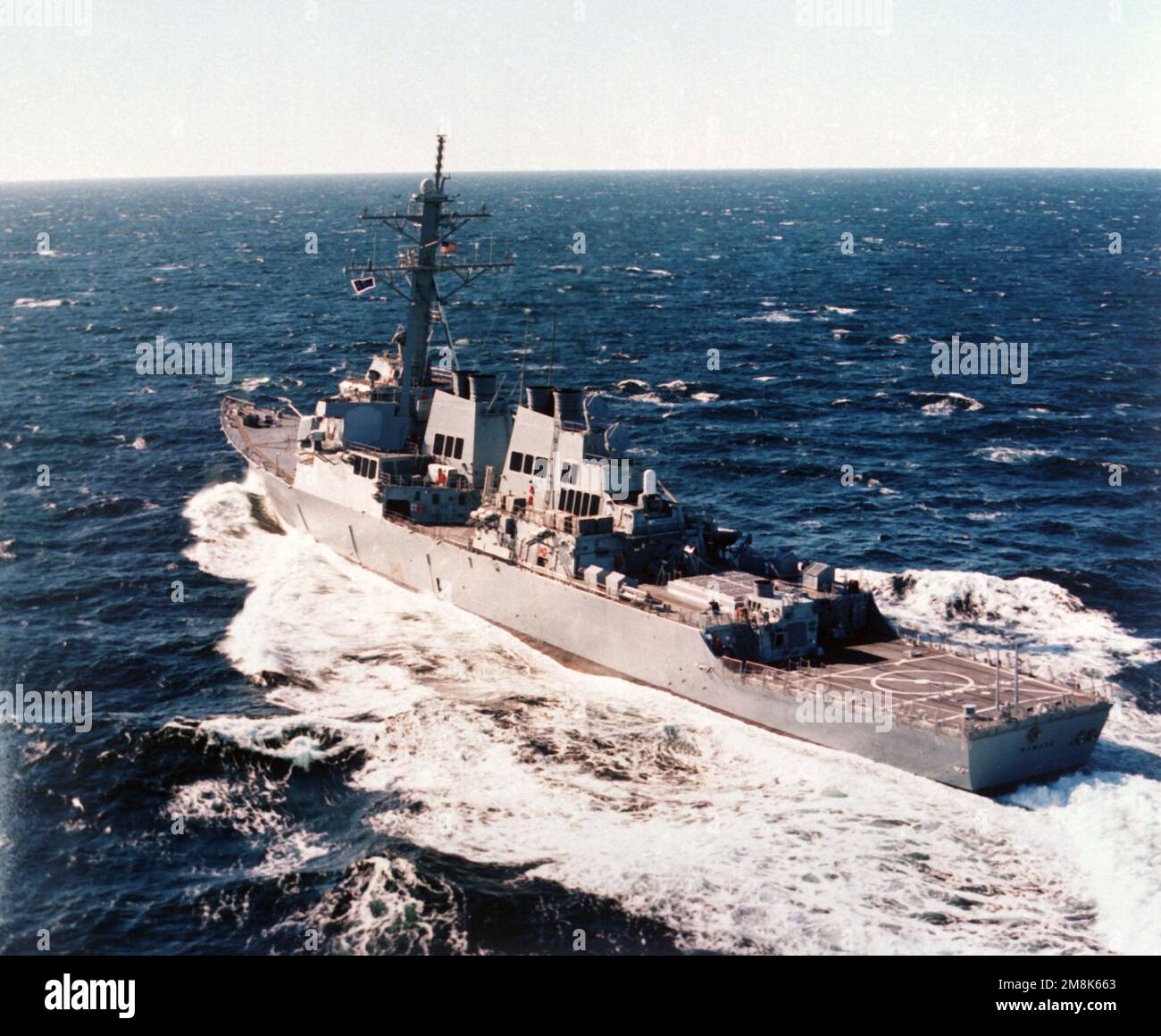 An aerial port quarter view (135 degrees off centerline) of the guided ...