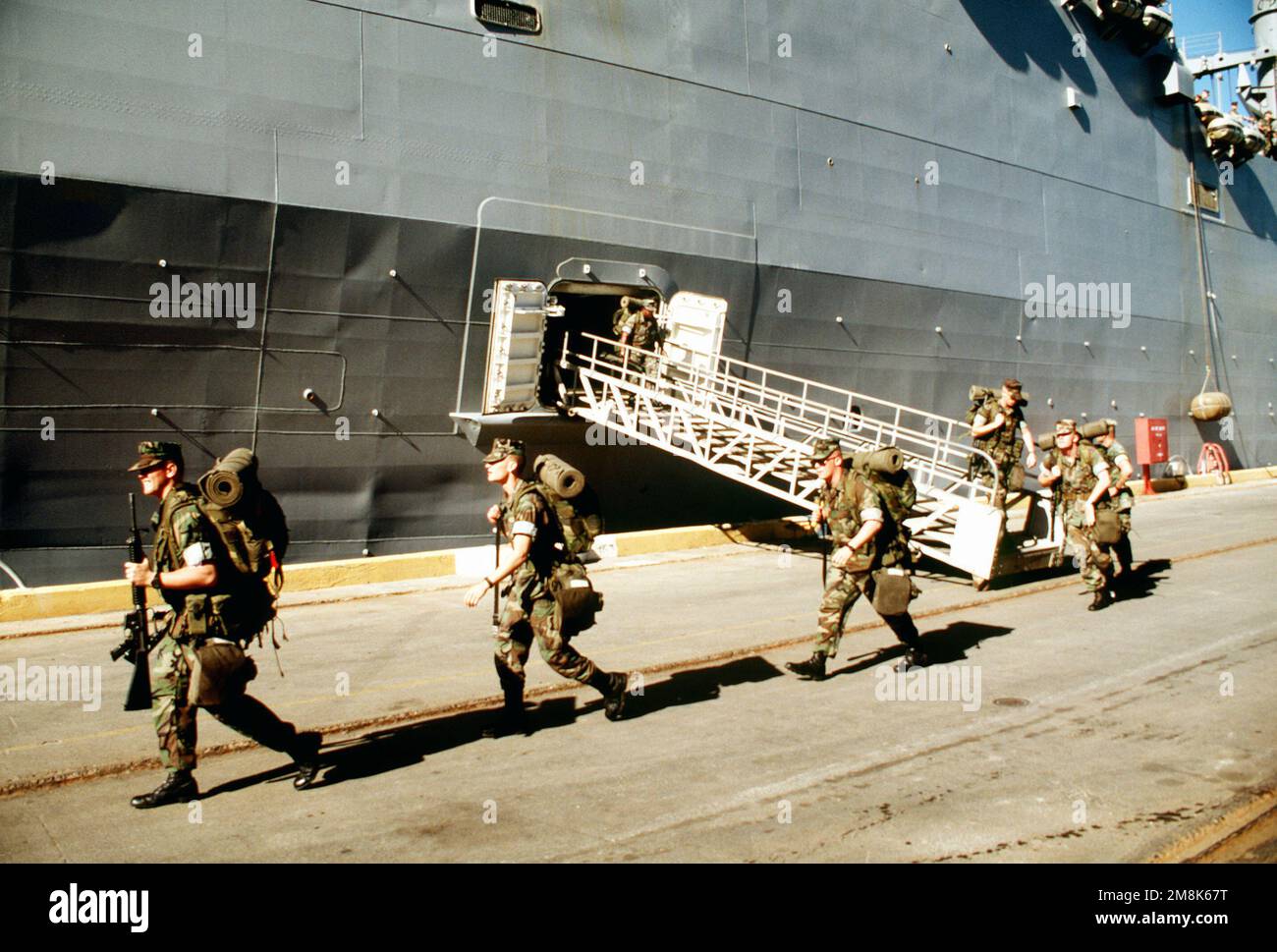 U.S. Marine Corps Battalion Landing Team 36 disembarks from USS AUSTIN ...