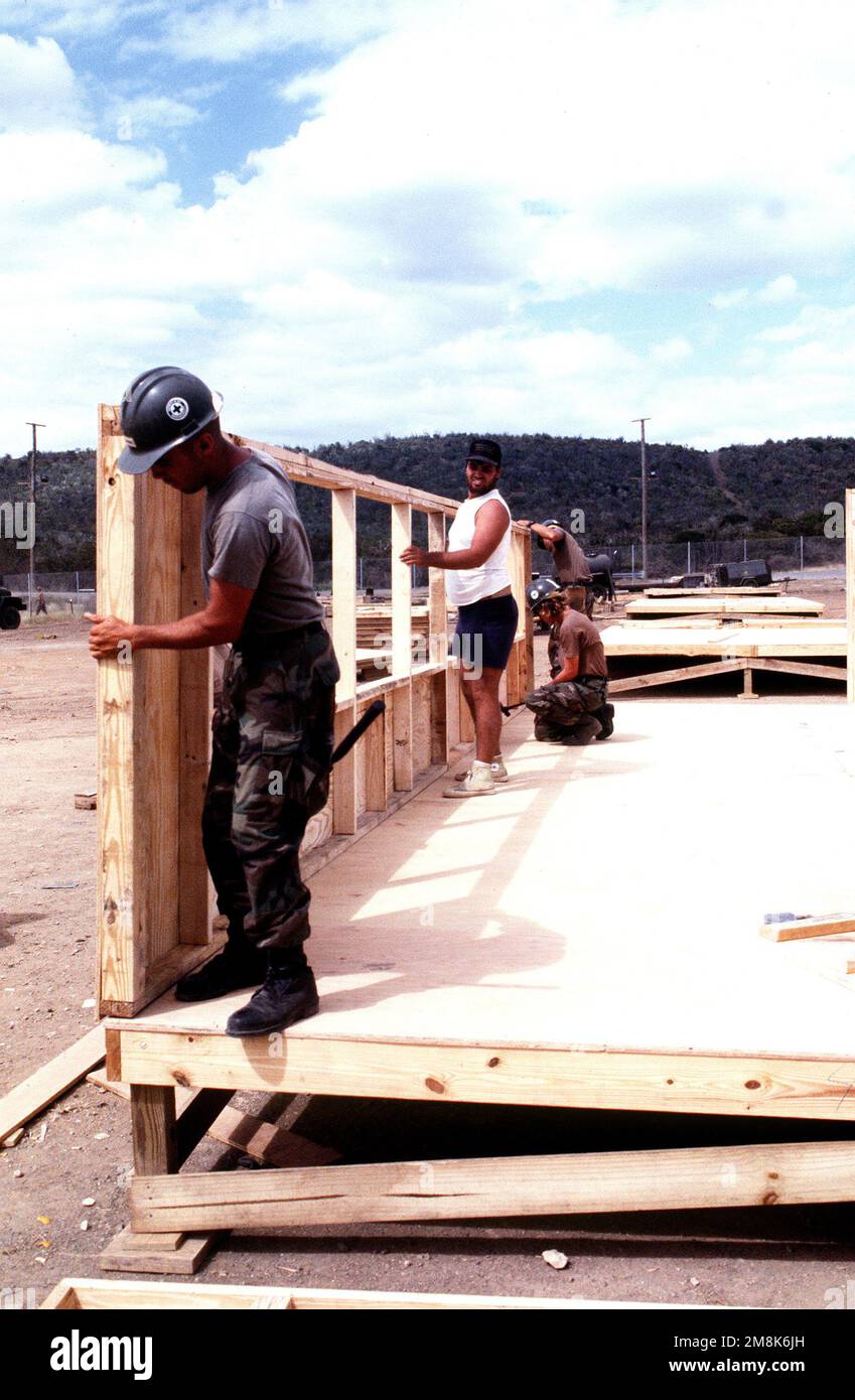 US Navy Seabees from Naval Mobile Construction Battalion 4 (NMCB-4) and ...