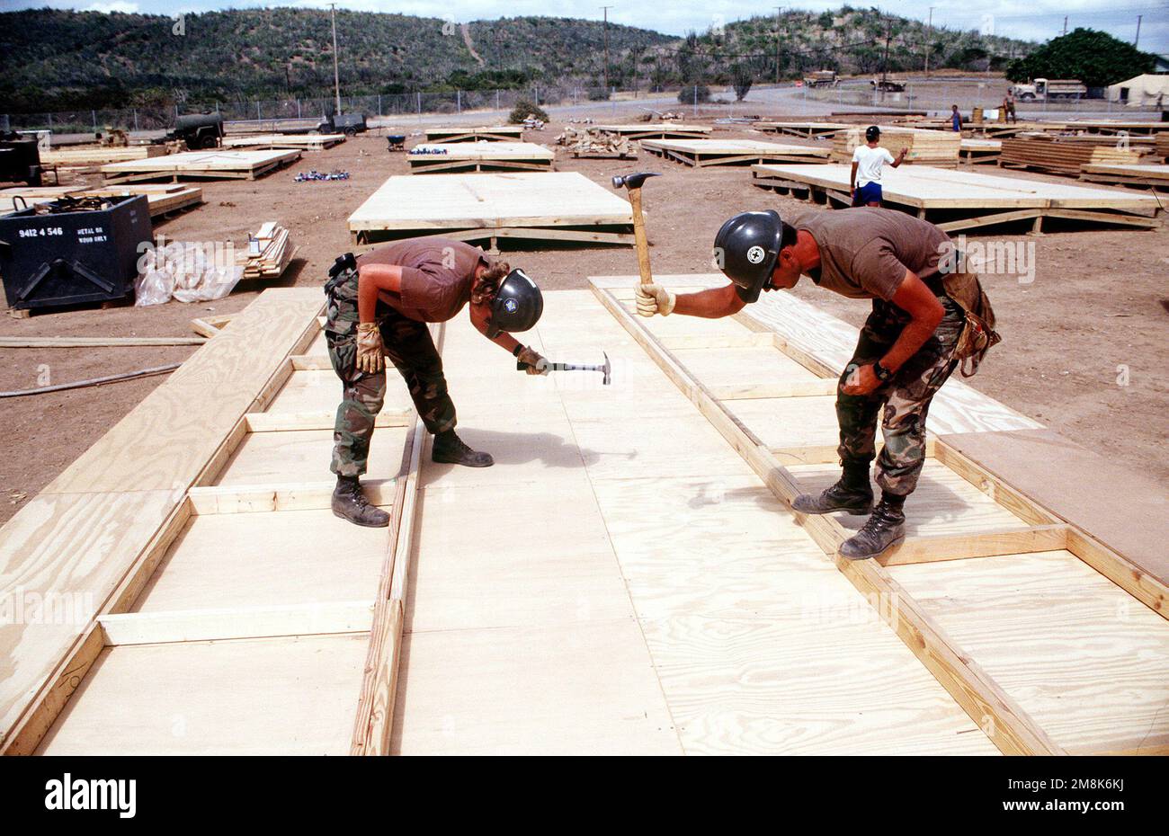US Navy Seabees from Naval Mobile Construction Battalion 4 (NMCB-4) and ...