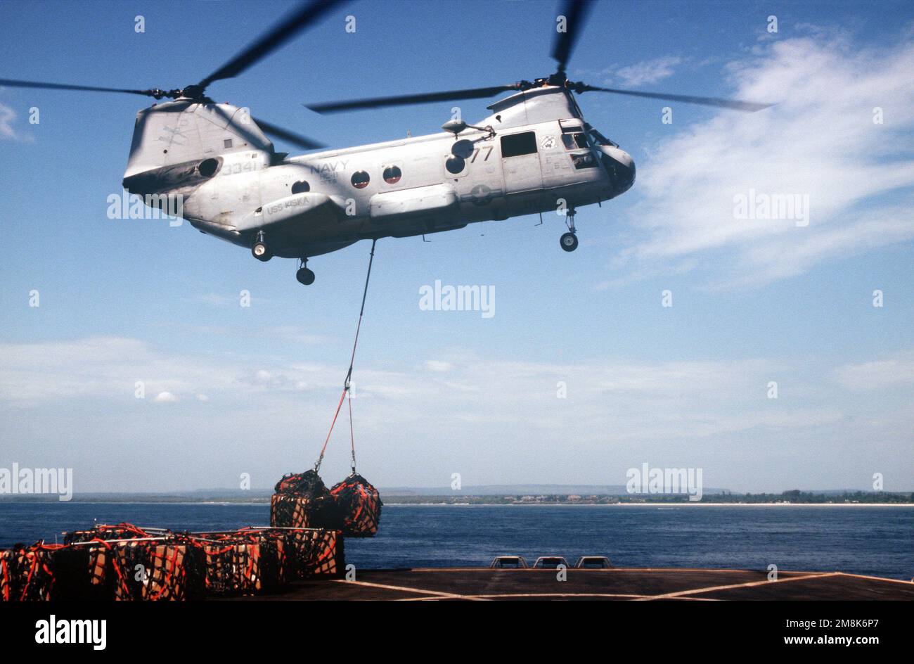 Operation UNITED SHIELD. A US Navy CH-46 Sea Knight helicopter lifts a ...